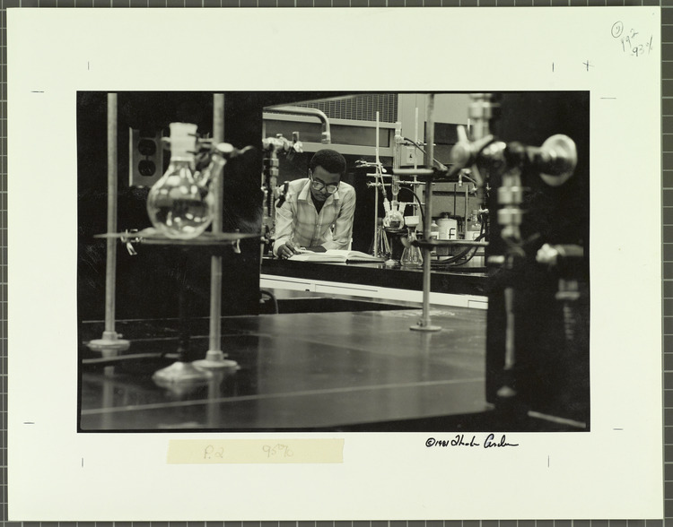 Portrait of unidentified student reading in a lab | Lehigh Preserve