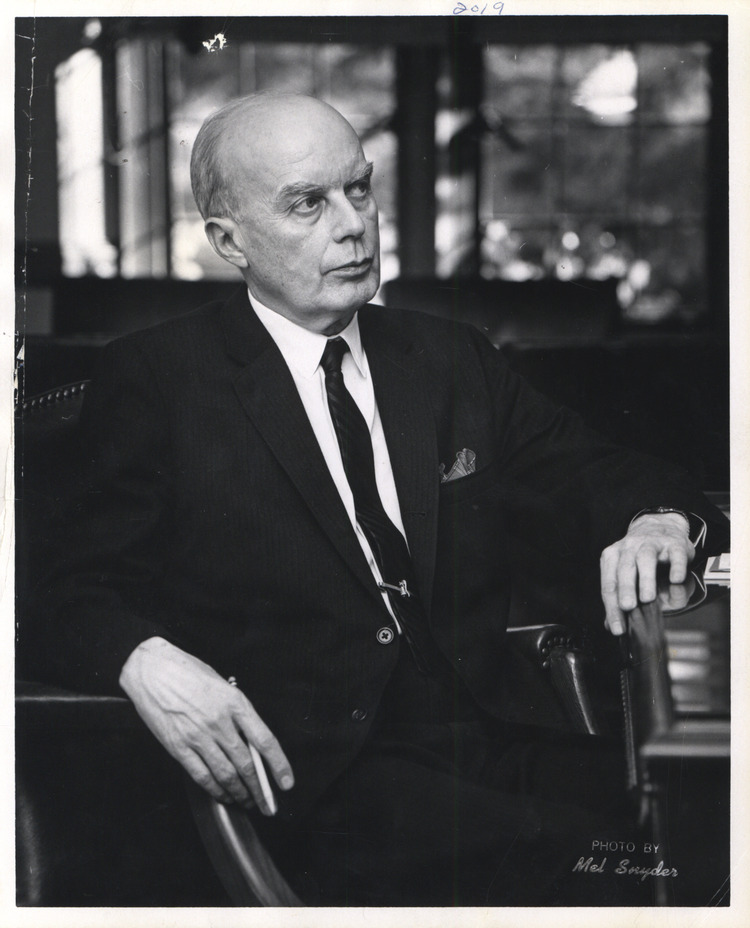 President sitting with pencil inhand; March 16,1963 | Lehigh Preserve