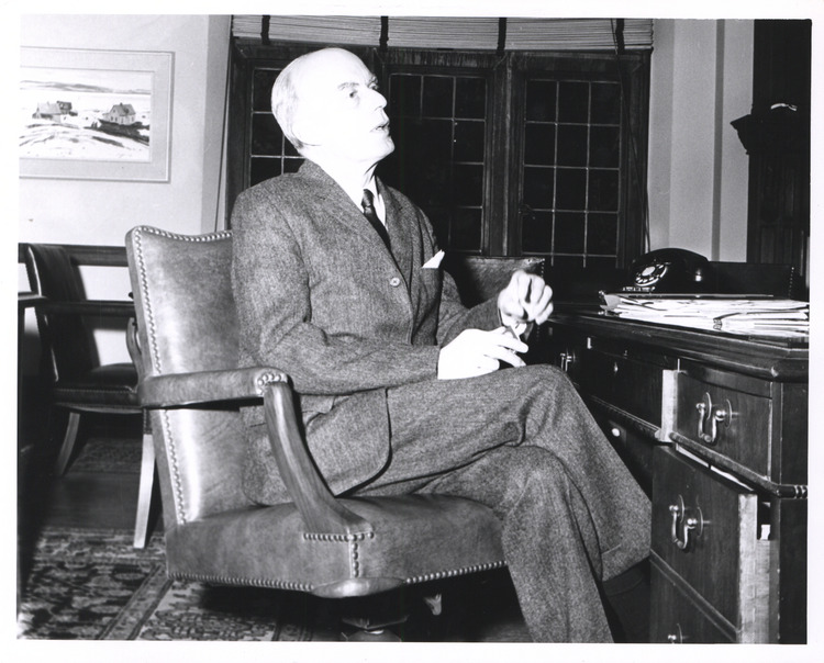 President sitting in his chair at desk | Lehigh Preserve