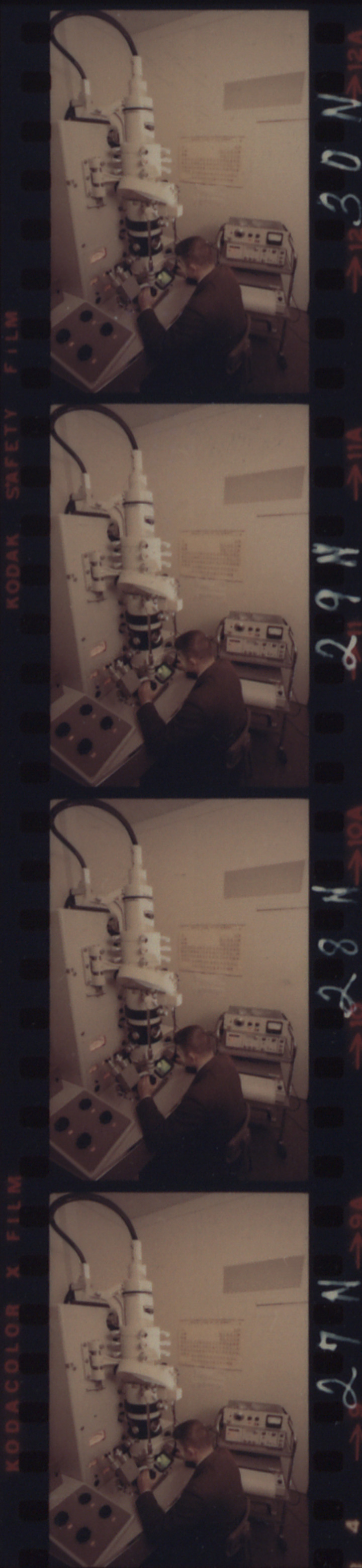 Homer Research Laboratory - Man using microscope | Lehigh Preserve