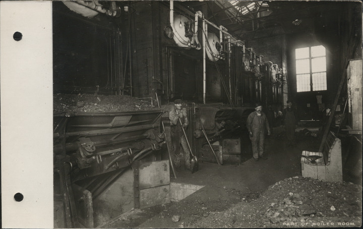 Photograph 22: Part of Boiler Room (three men standing by boilers ...
