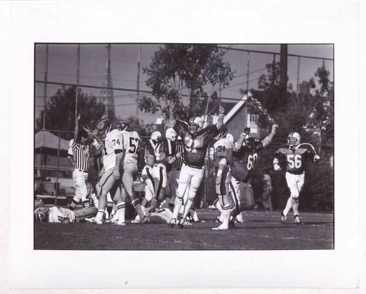 Lehigh football players with fists in air | Lehigh Preserve