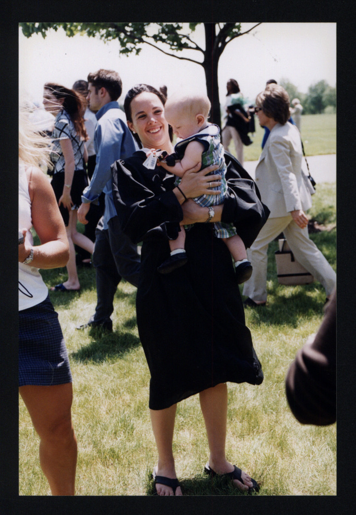 Female graduate holding baby | Lehigh Preserve
