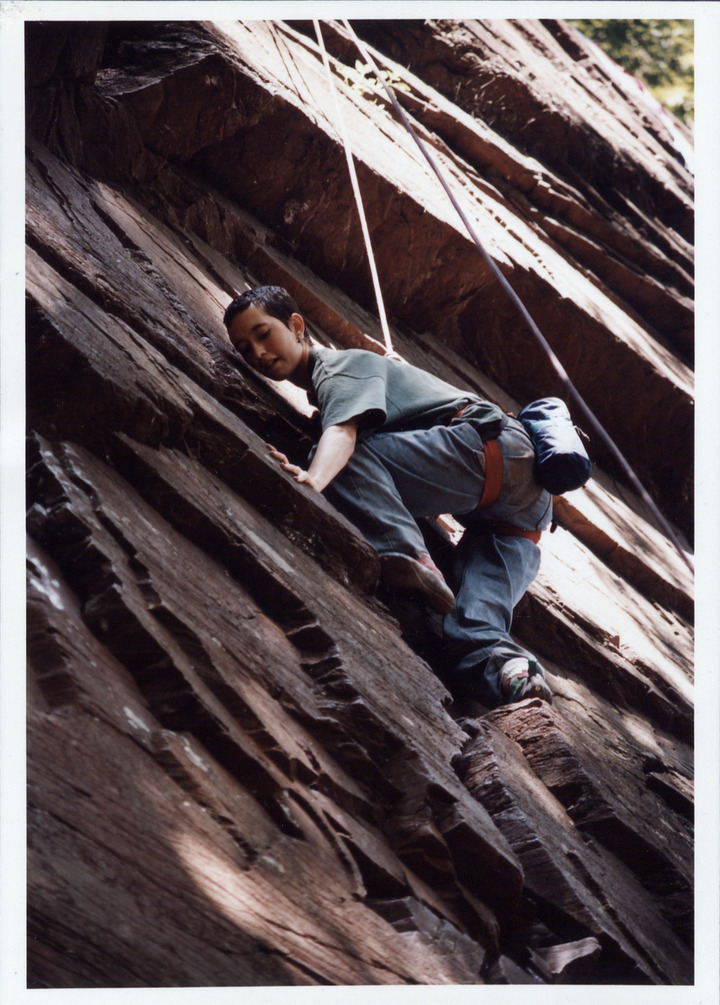 Student climbing ledge with equipment | Lehigh Preserve