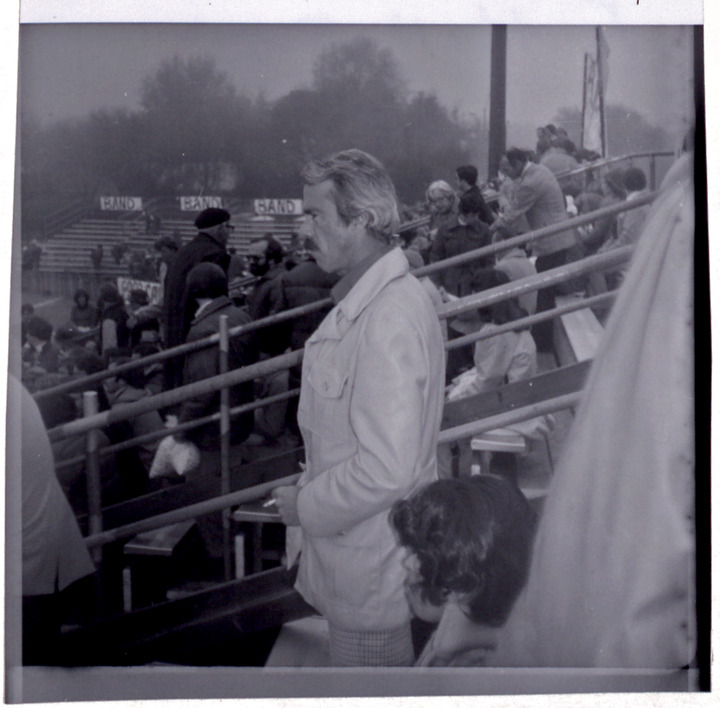 Man smoking a cigarette stands amongst the fans in the stands | Lehigh ...